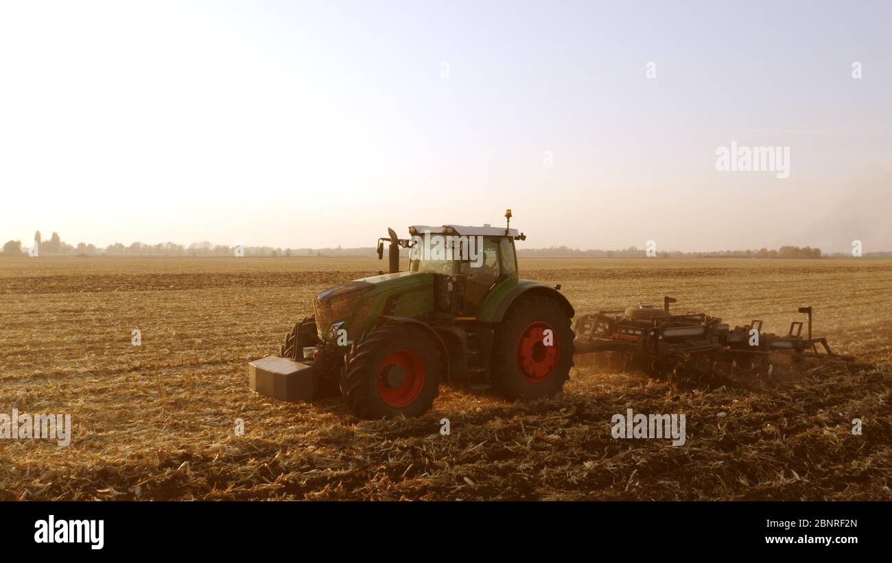 Tractor working on field hi-res stock photography and images - Alamy