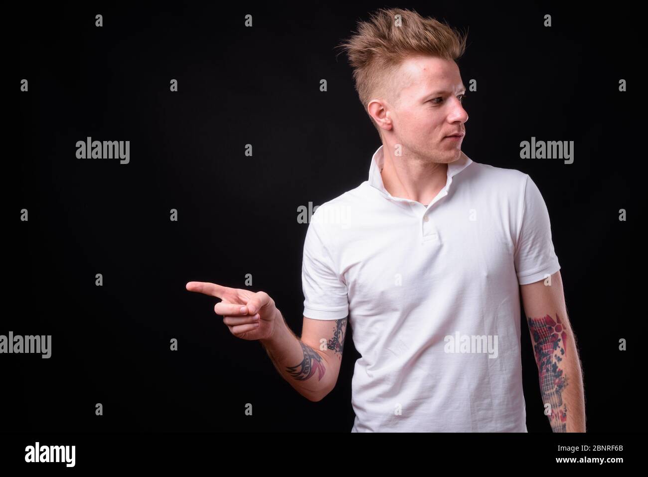 Portrait of rebellious man as punk rocker Stock Photo - Alamy