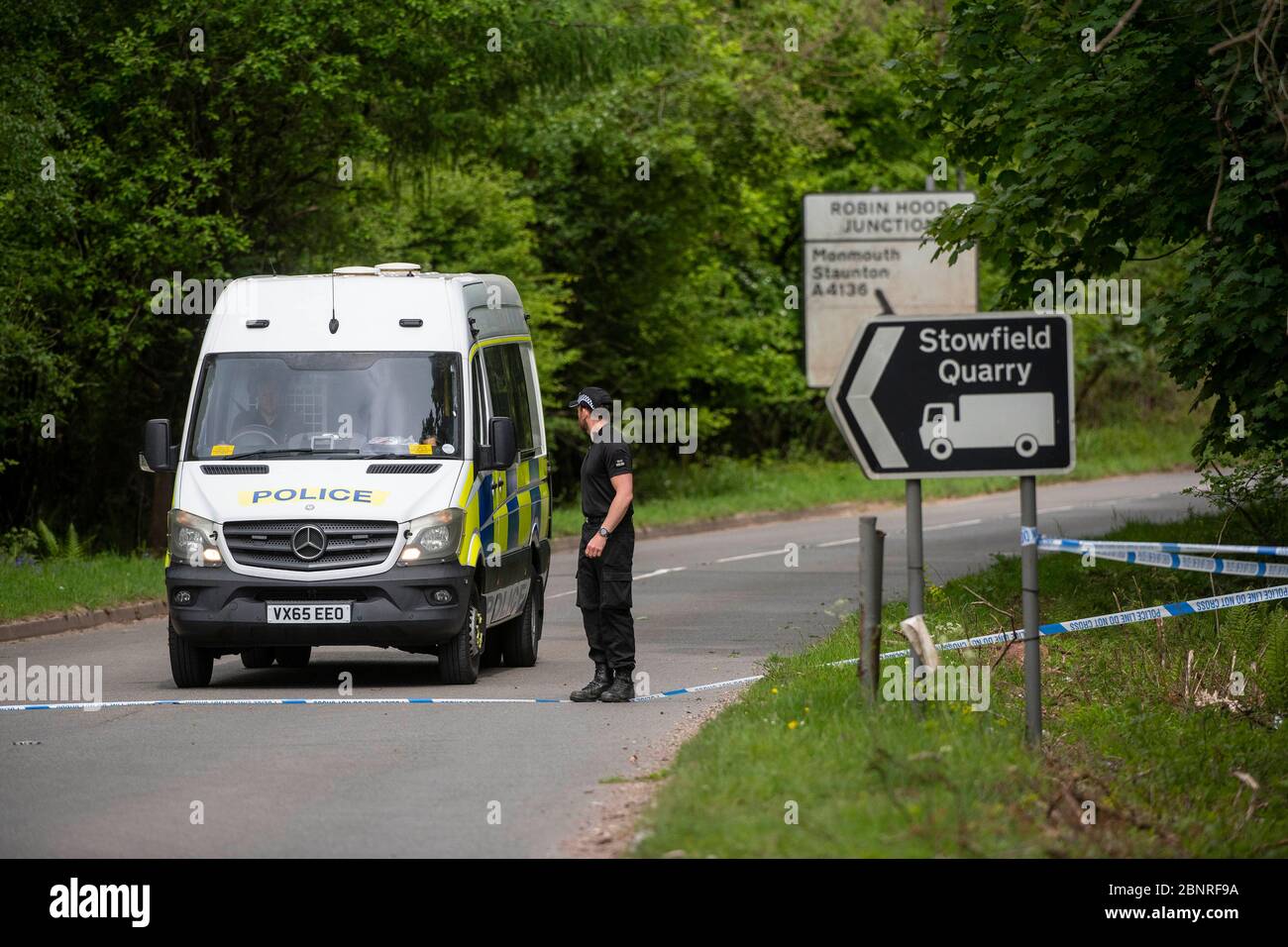 A police search team search woodland next to Stowfield Quarry near ...