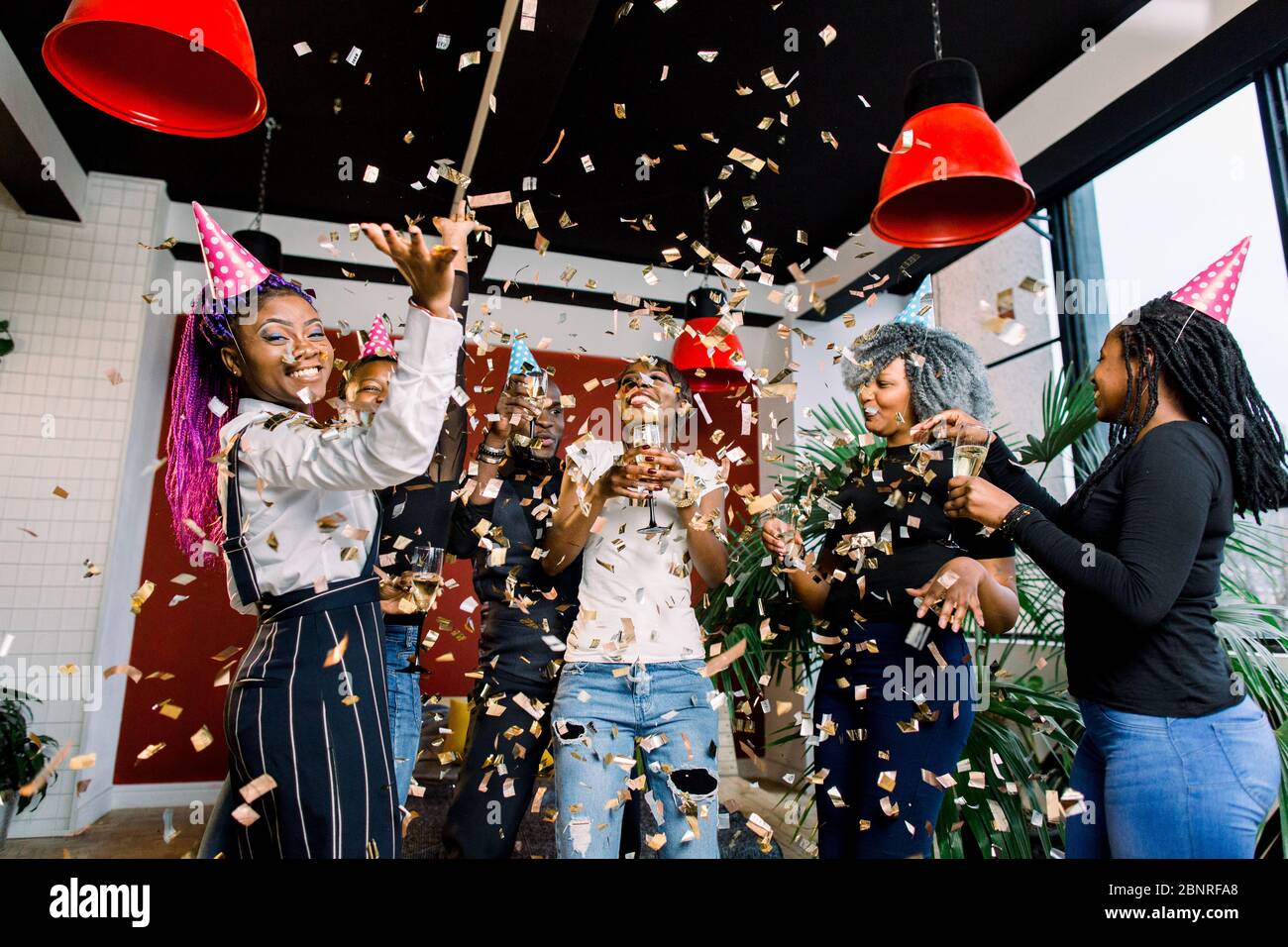 Girl throwing confetti hi-res stock photography and images - Alamy