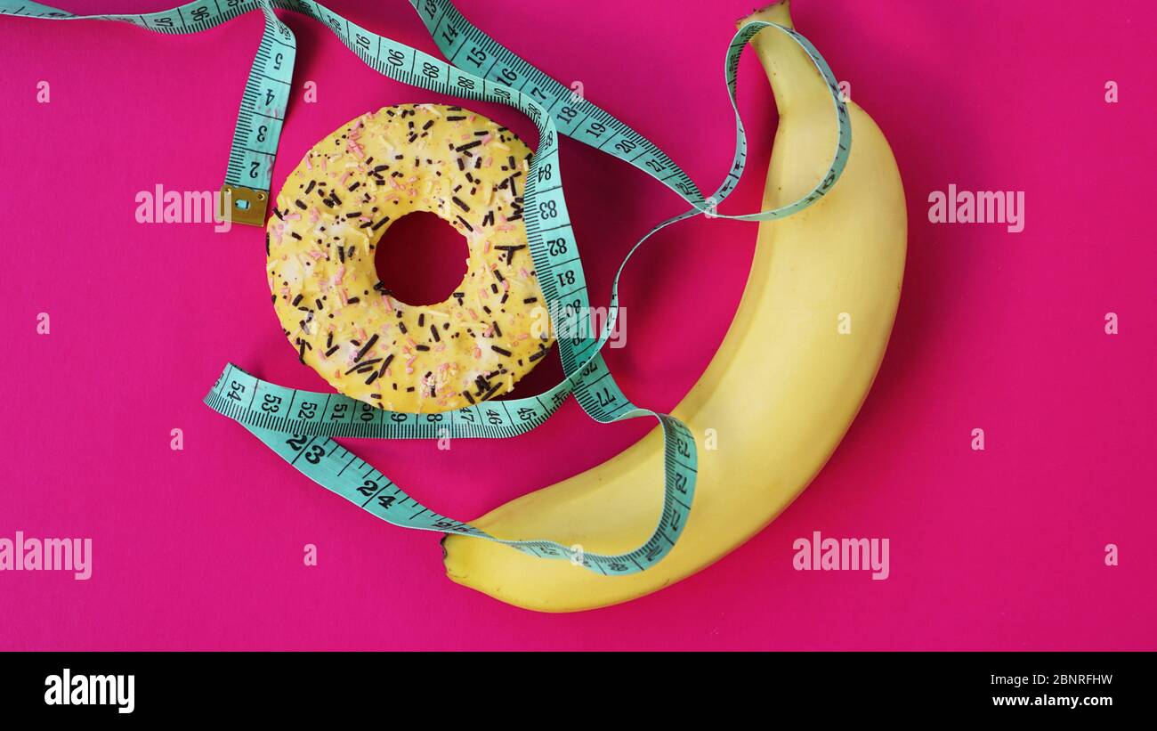 Two types of food, healthy and unhealthy, banana and donut, diet and ...
