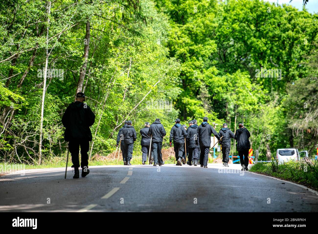 A police search team search woodland next to Stowfield Quarry near ...