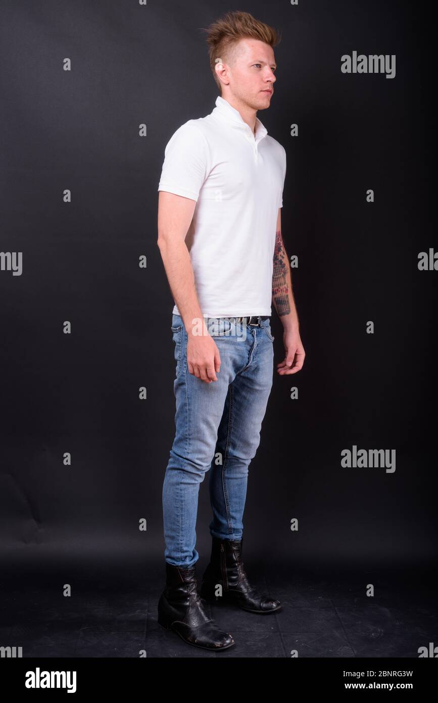 Full body shot of rebellious man as punk rocker Stock Photo - Alamy