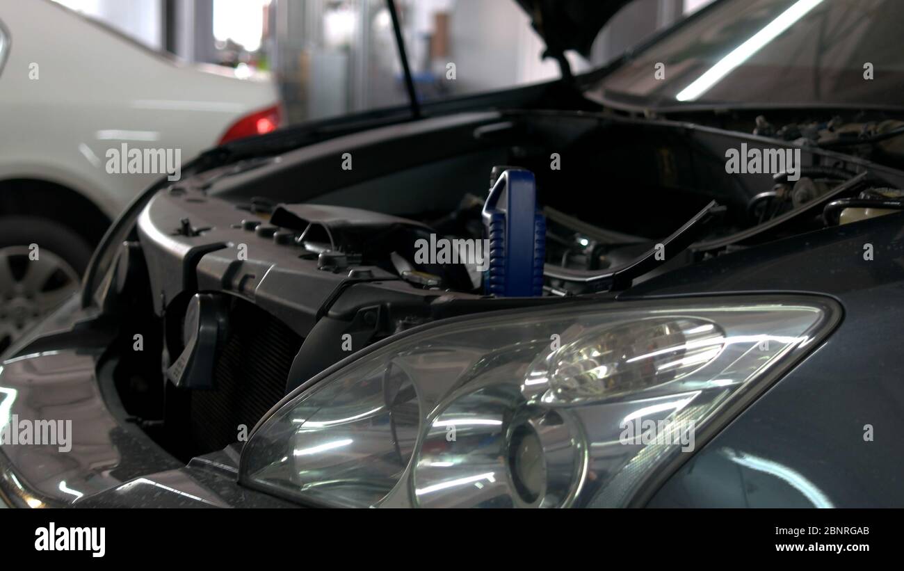 Opened car engine Stock Photo - Alamy