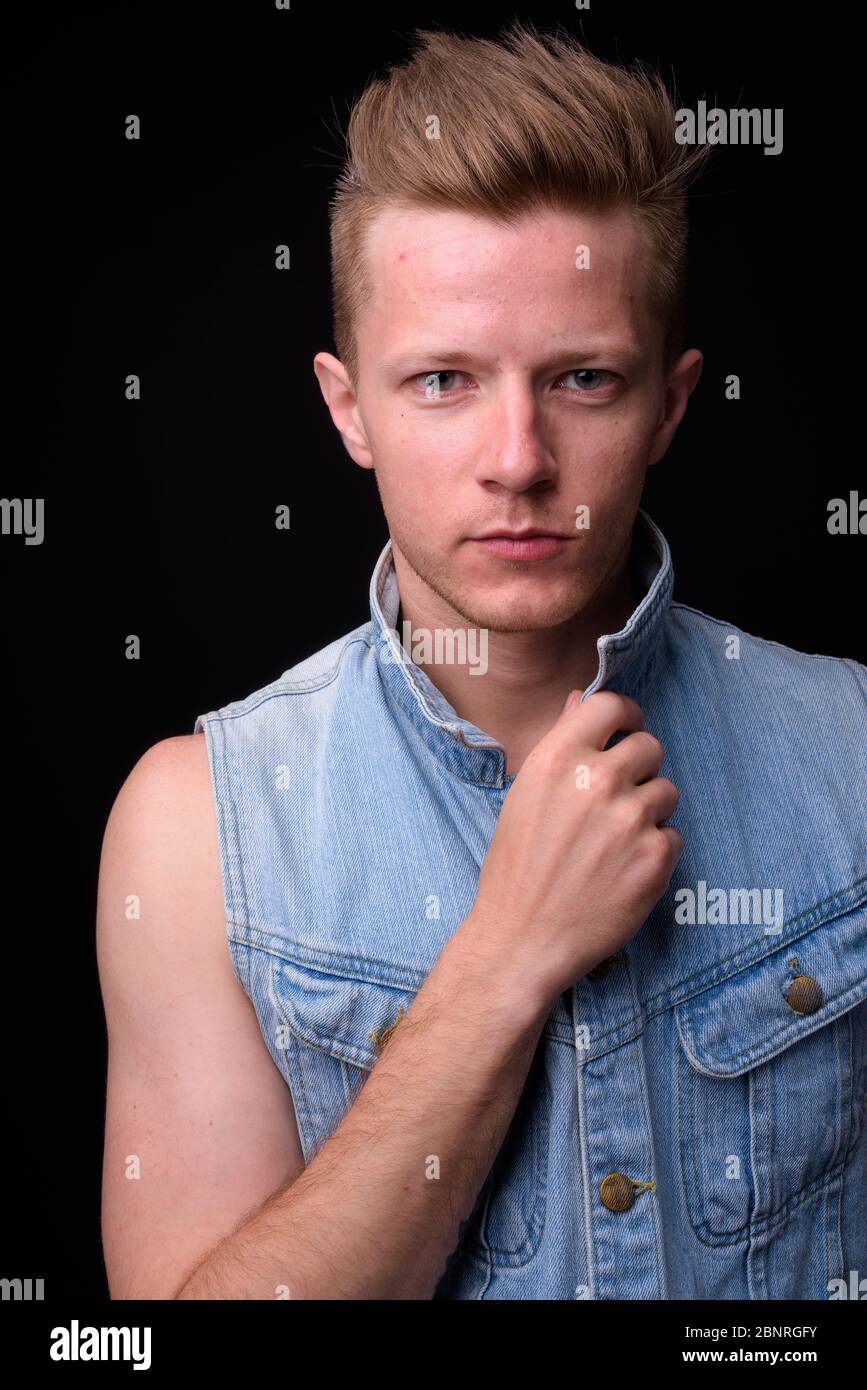 Portrait of rebellious man as punk rocker Stock Photo - Alamy