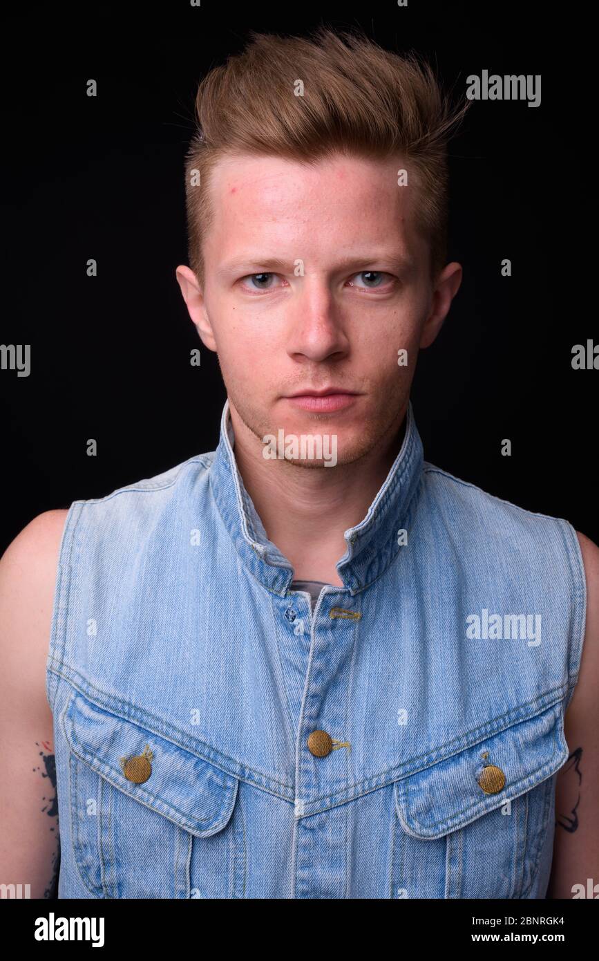 Face of rebellious man as punk rocker Stock Photo - Alamy