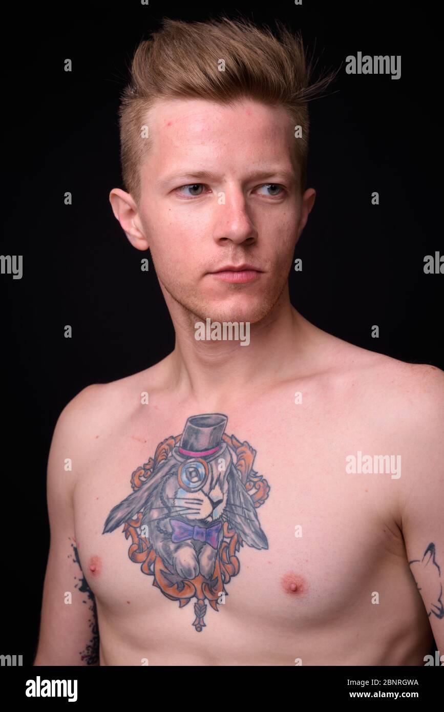 Face of rebellious man as shirtless punk rocker Stock Photo - Alamy