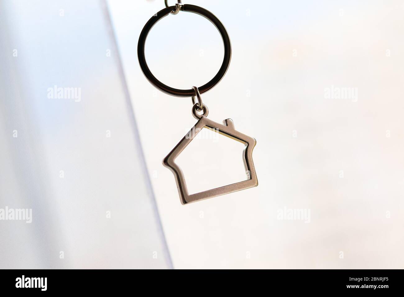 House key keychain cottage hi-res stock photography and images - Alamy