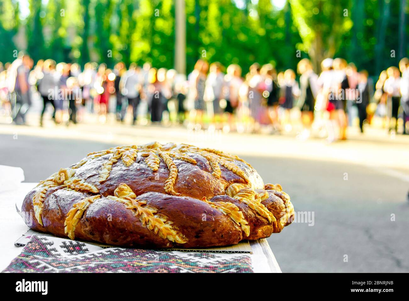 karavay on the table amid children from elementary school on the first ...