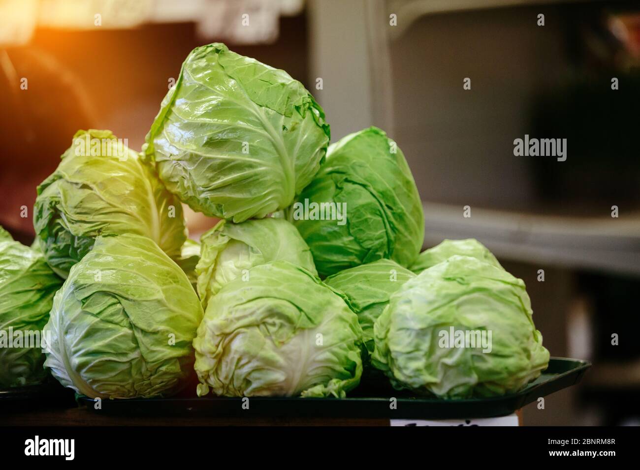 Green cabbage at Farmers' market Stock Photo - Alamy