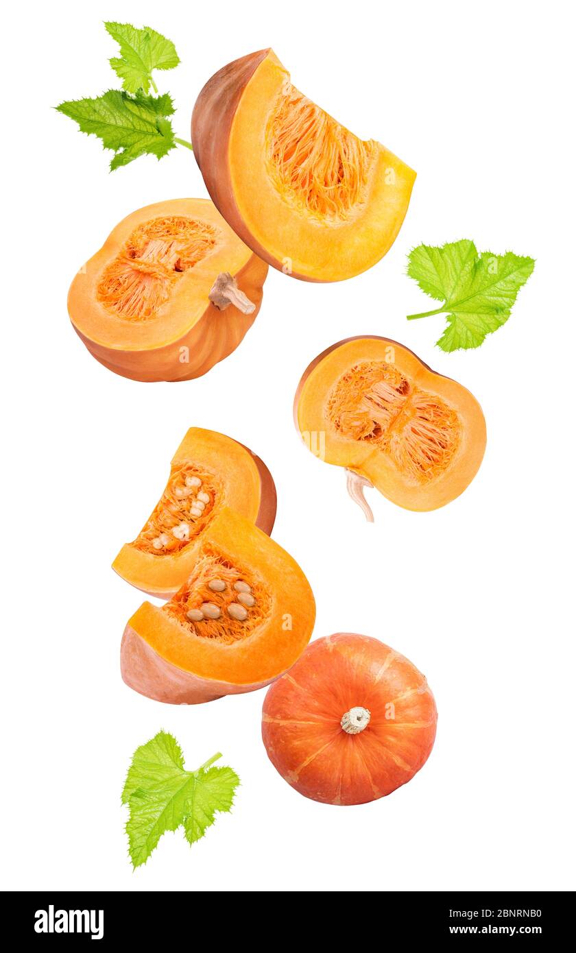 Falling pumpkins isolated on white background Stock Photo - Alamy