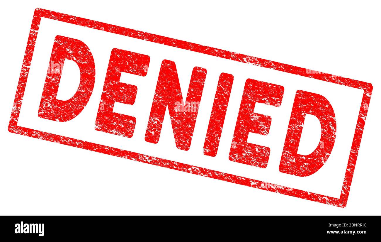 Denied message from a red rubber ink stamp on an isolated white ...