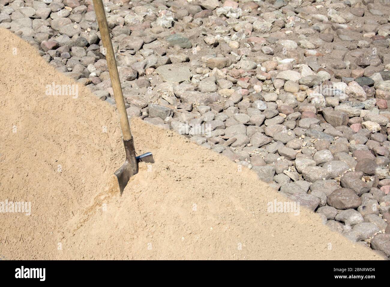 Shovel for scoop sand in construction work, sand material and stones ...