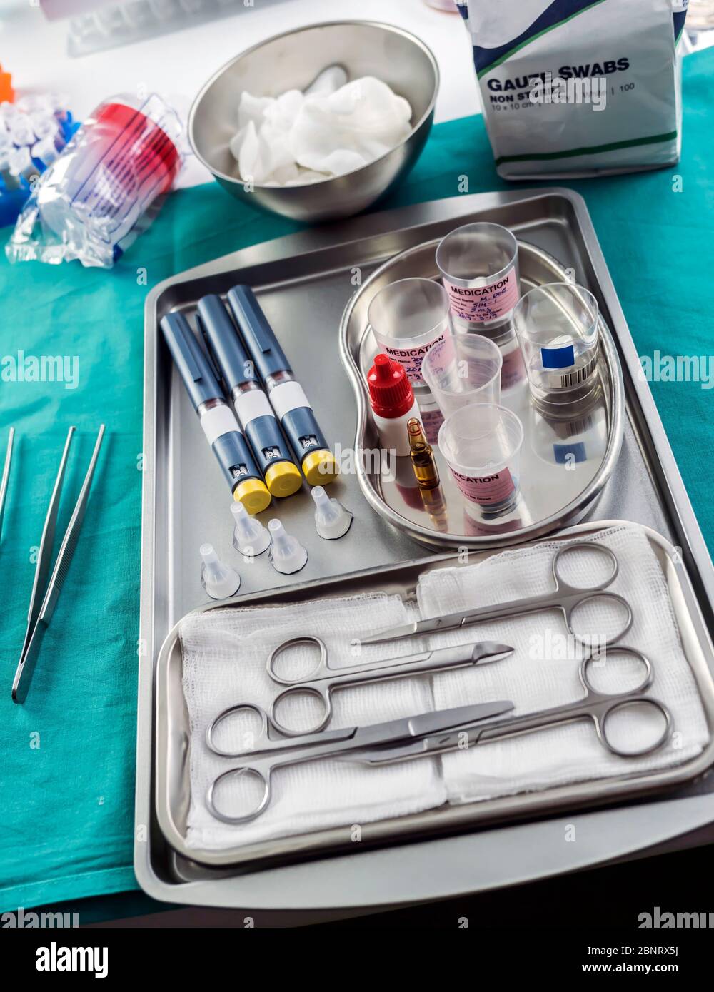 Diverse medication in glasses monodose along with insulin injectors in ...