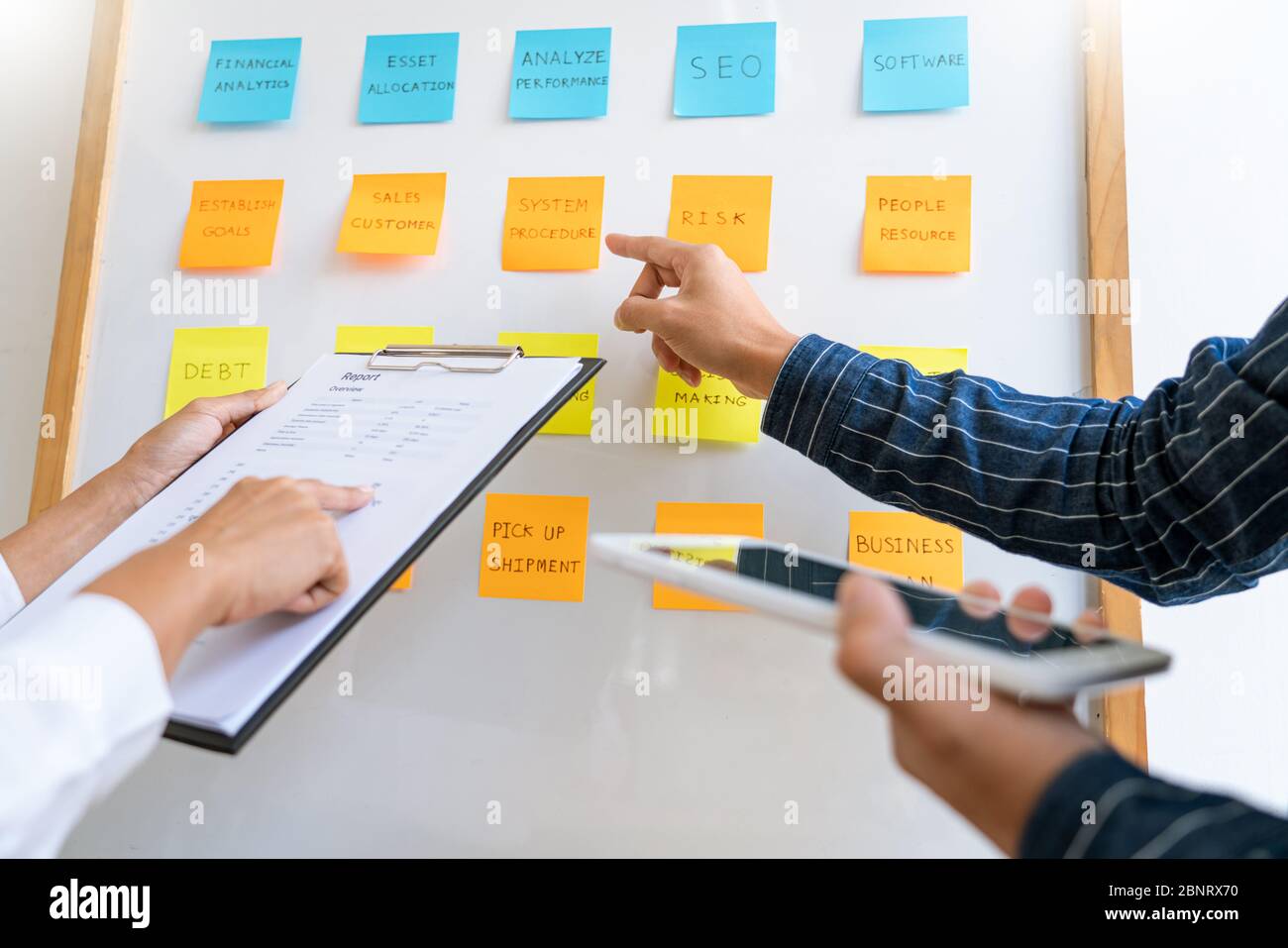 Woman focus on working post it notes hi-res stock photography and ...