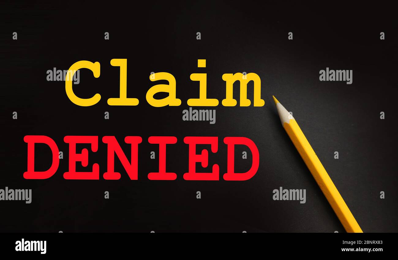 Claim denied words and yellow pencil besides. Application rejected ...
