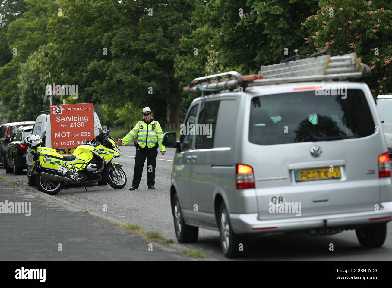 Police stopping vehicles on the A23 road between London and Brighton ...