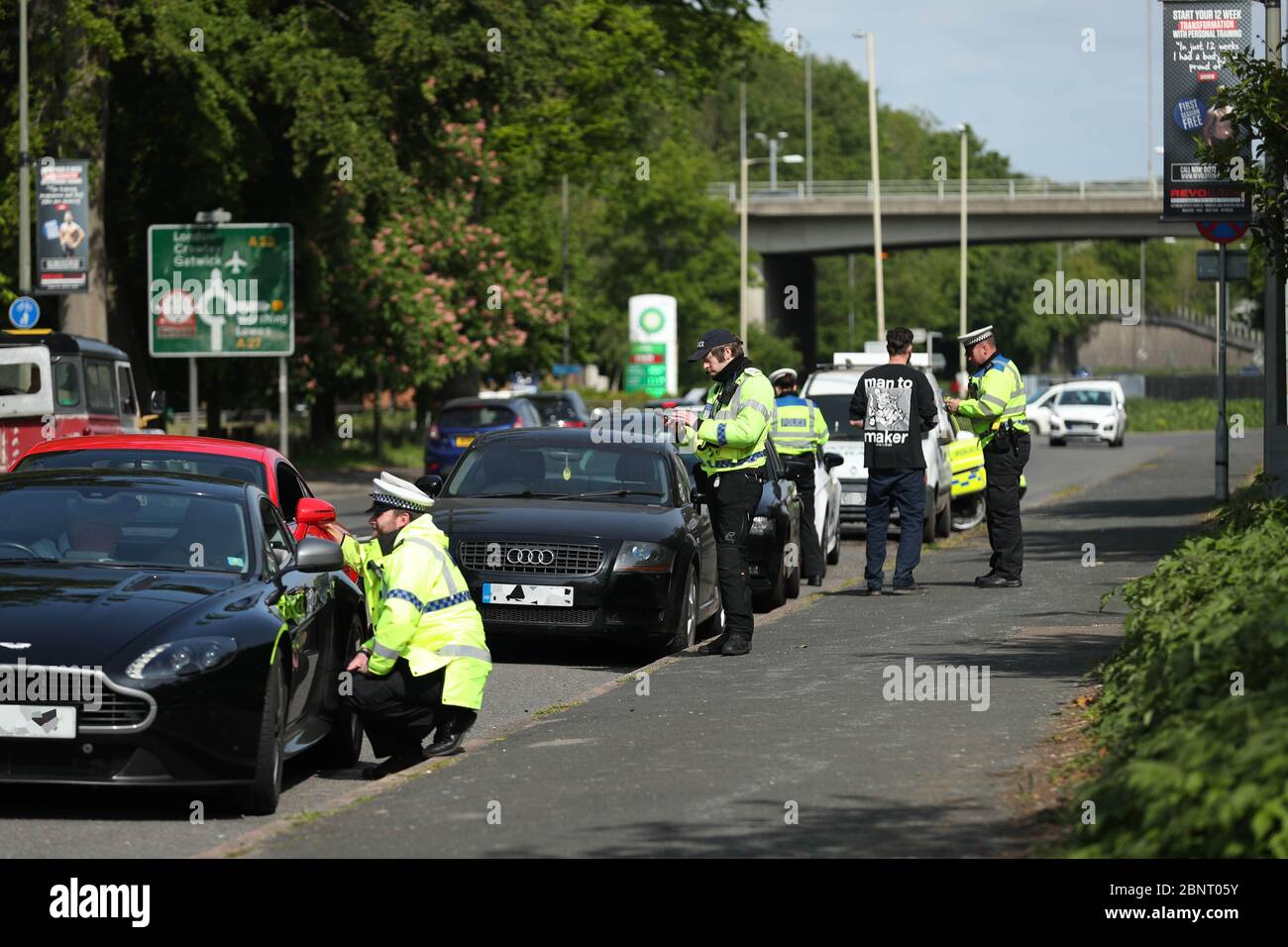 Police stopping vehicles on the A23 road between London and Brighton ...