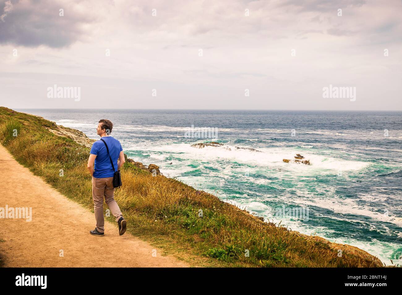 Dirt road man walking hi-res stock photography and images - Alamy