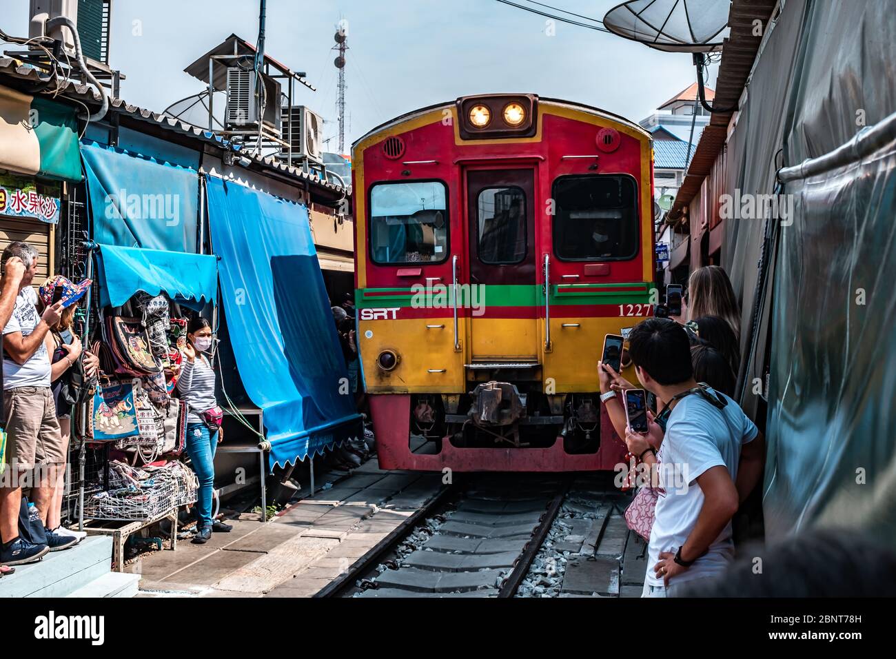 Mae Klong / Thailand - February 11, 2020: Name of this place Maeklong Railway Market or known as ...