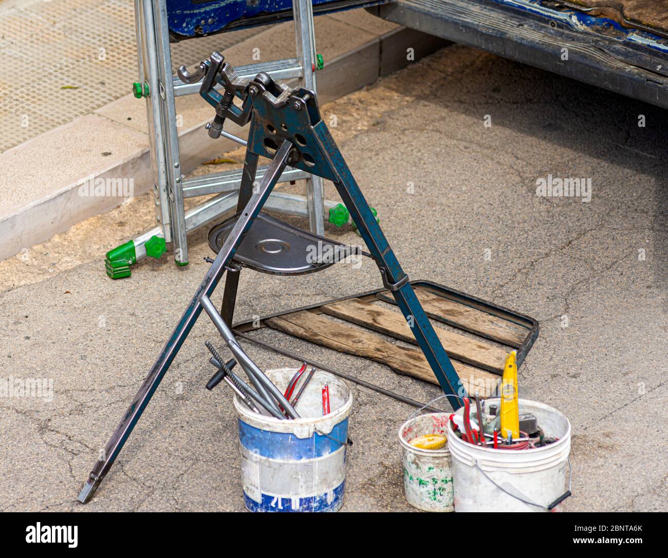 Pipe cutter positioned in a mobile construction site for cutting ...