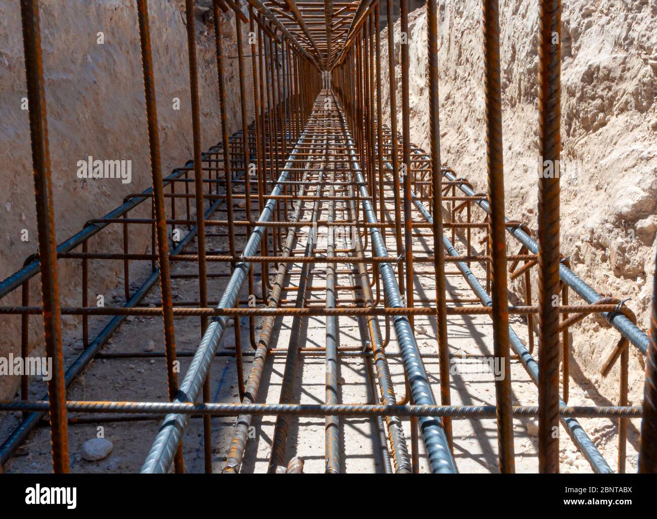 Design of reinforced concrete foundations. Constructed by workers ...