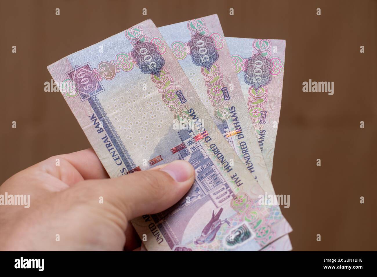 Uae dirhams hand hi-res stock photography and images - Alamy