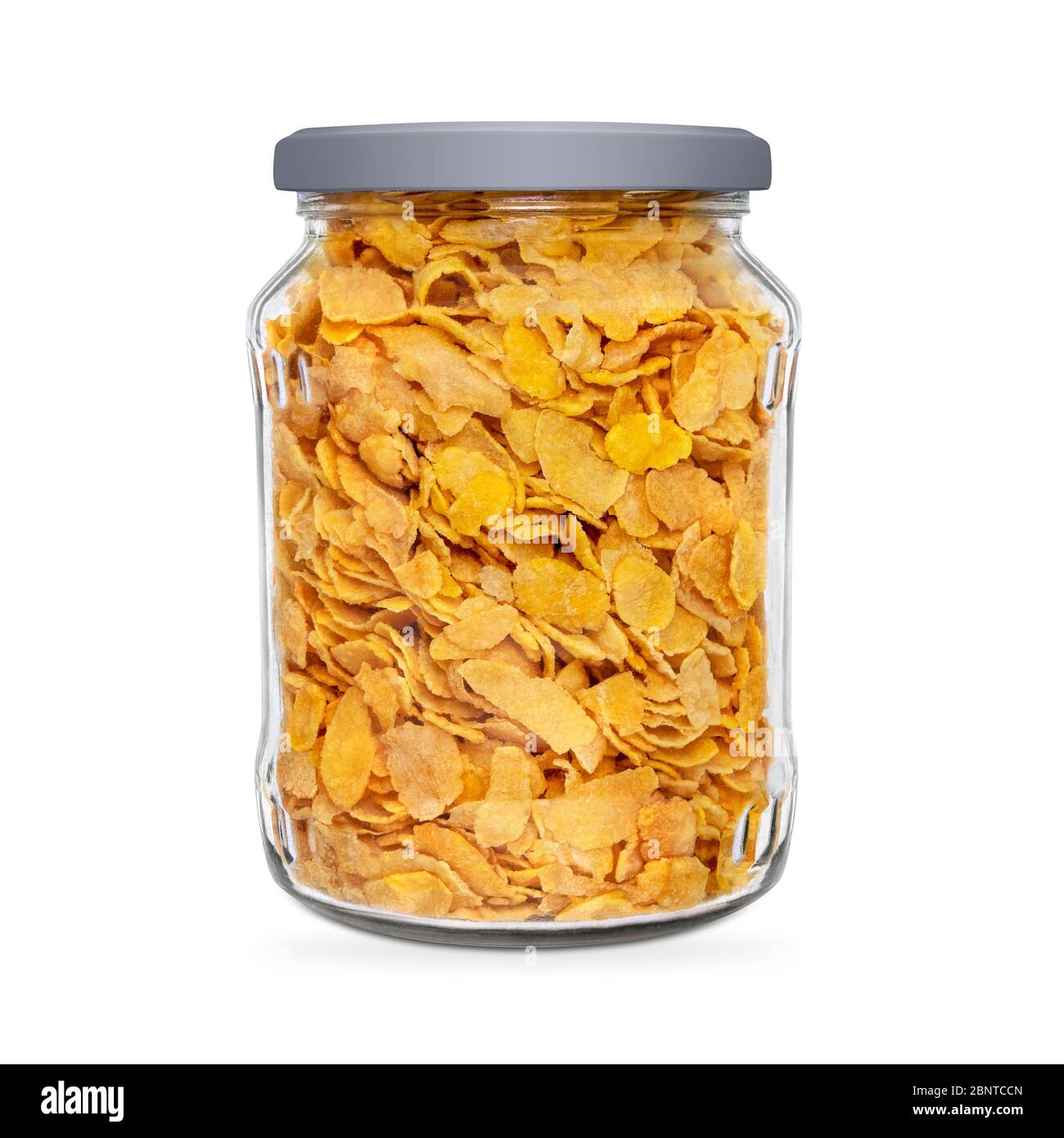 glass jar with cornflakes isolated on the white background with shadow ...