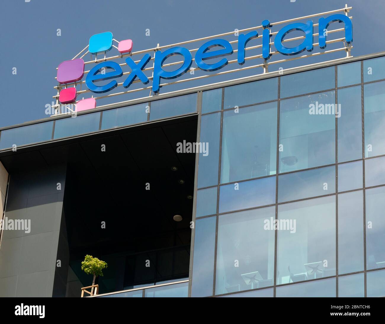 Experian logo and sign exterior view on the Space Tower glass office ...