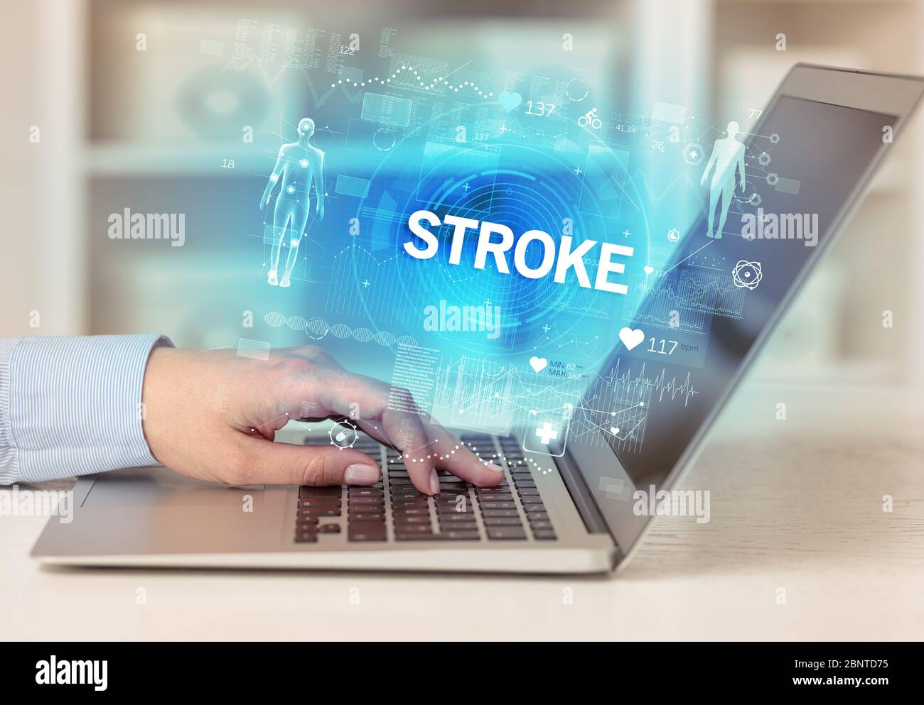 Doctor working a health check with STROKE inscription, recording ...