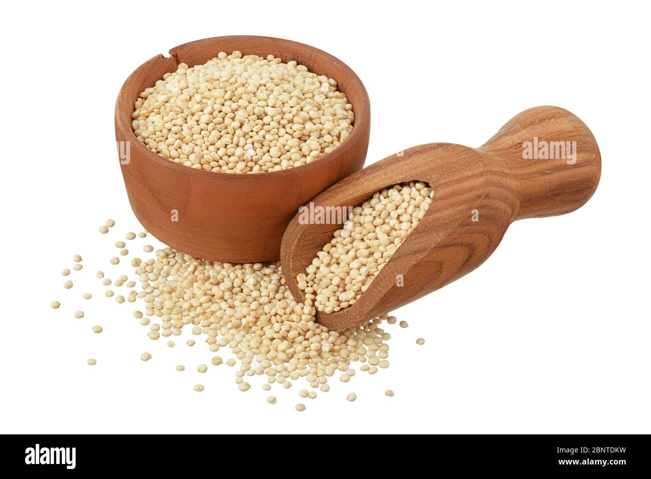 white quinoa seeds in wooden bowl isolated on white background with ...
