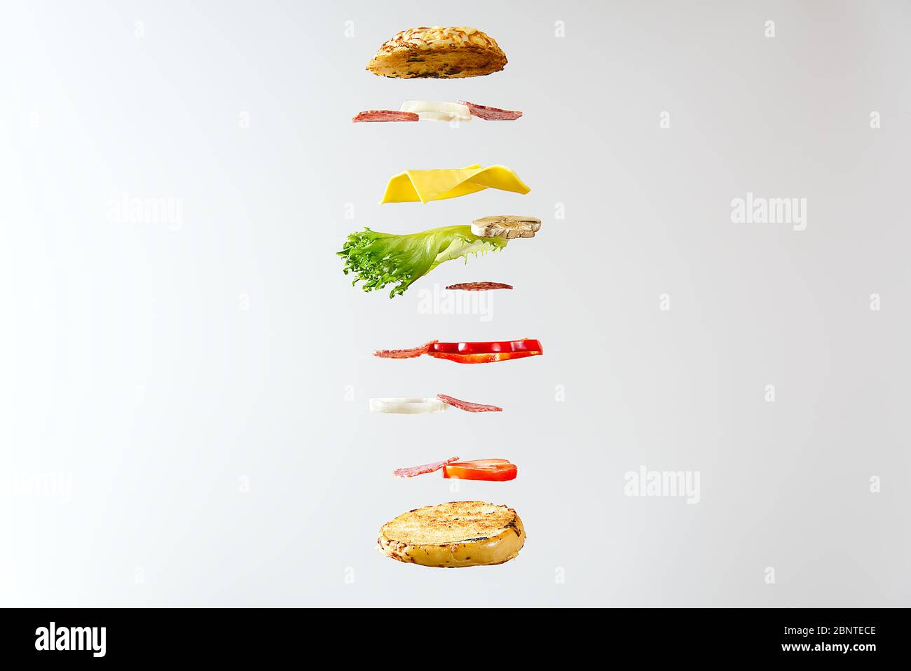 flying sandwich. Flying layers of sandwich. Well roasted patty, Ham ...