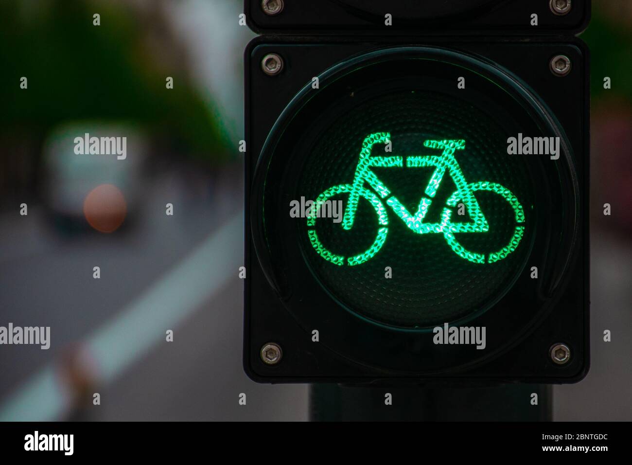 Sustainable transport. Bicycle traffic signal, green light, road bike ...