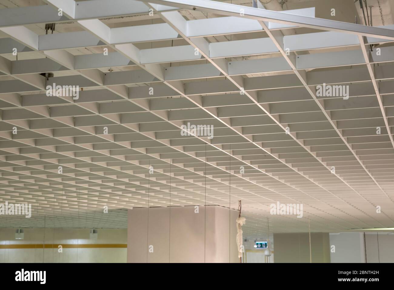Installation of suspended ceilings and lighting Stock Photo - Alamy