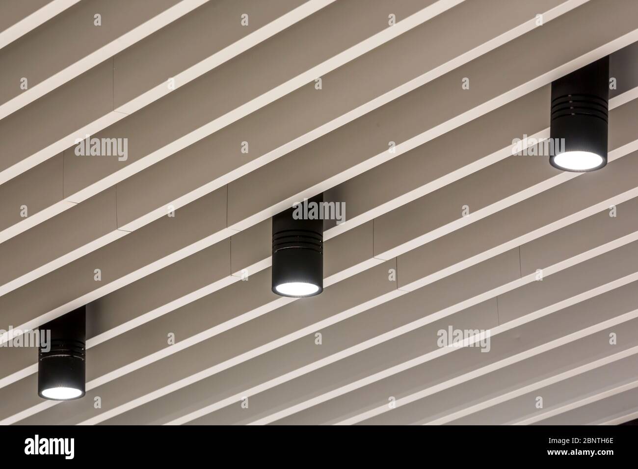 Installation of suspended ceilings and lighting Stock Photo - Alamy