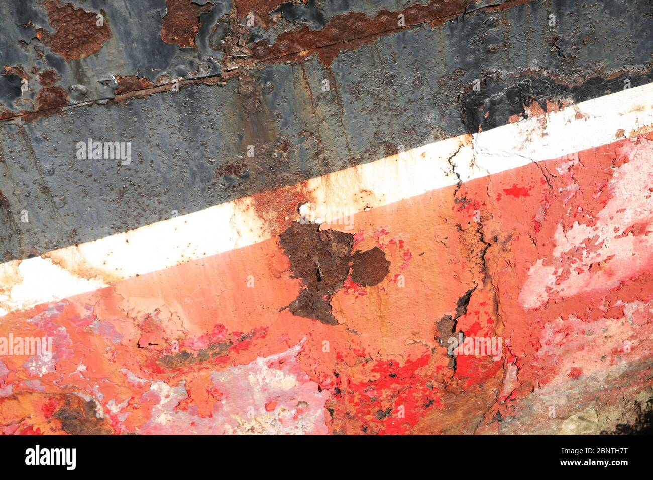 The rusty wreck of the paddlesteamer Ryde, resting in a mud berth at ...