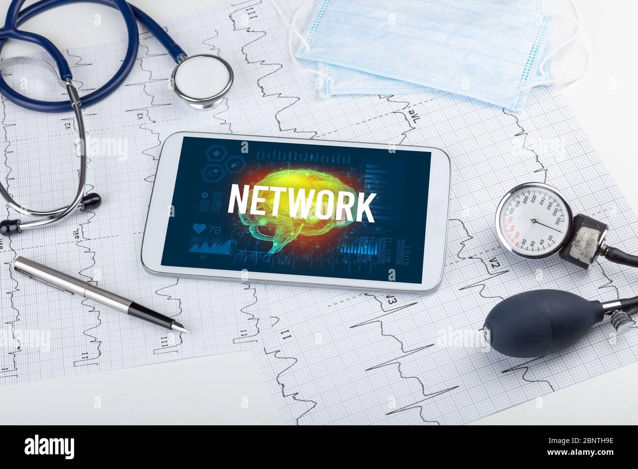 Tablet pc and medical tools with NETWORK inscription, social distancing ...
