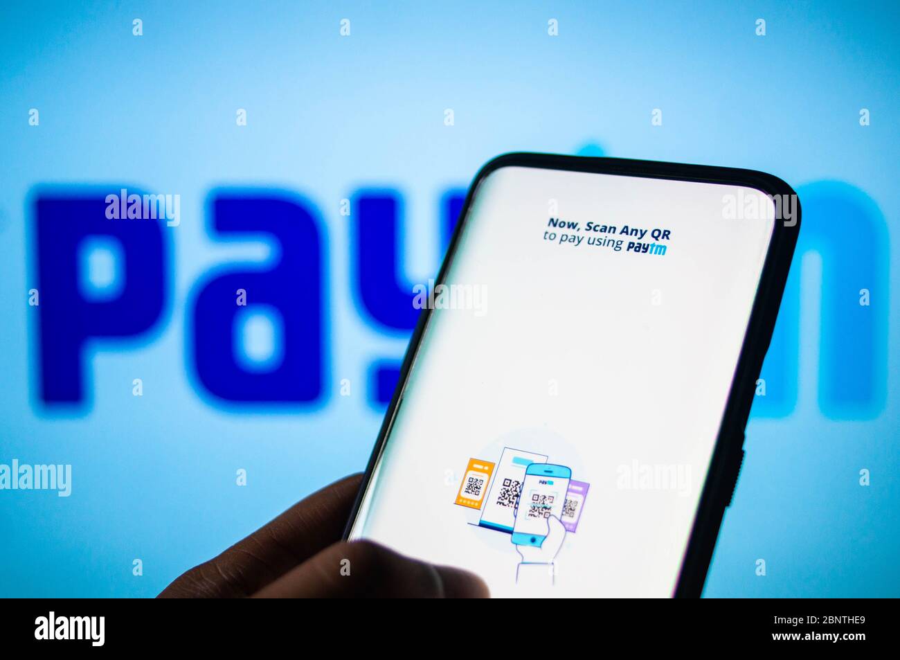 Paytm app logged in on a mobile infront of a white screen with Paytm ...
