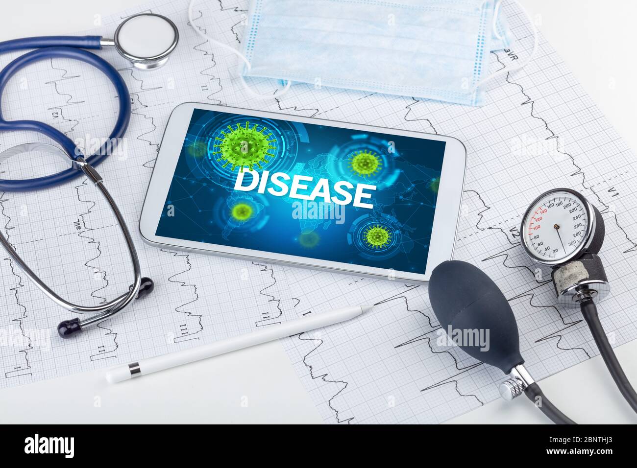 Close-up view of a tablet pc with DISEASE inscription, microbiology ...