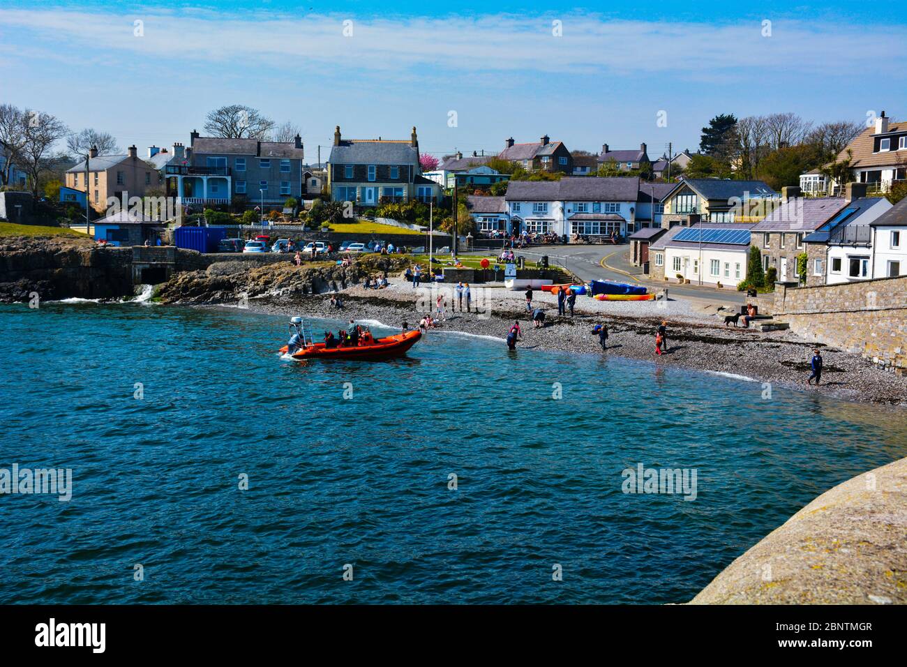 Moelfre beach on Anglesey in North Wales during Summer Stock Photo - Alamy