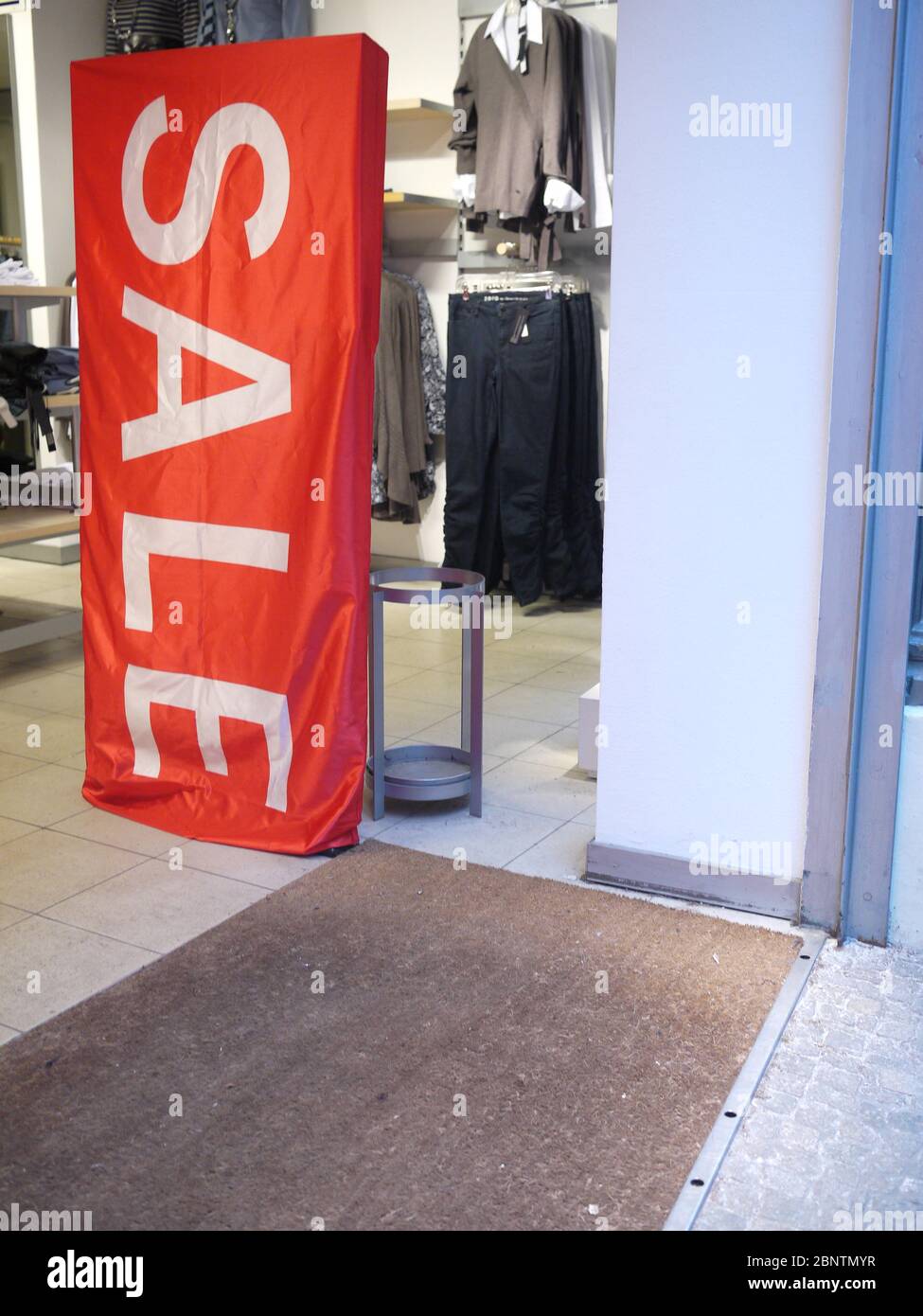 Sale Sign On Glass Window Stock Photo - Alamy