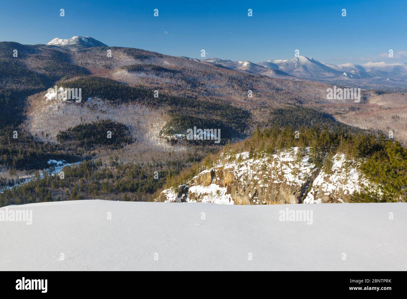 Mount Chocorua covered in snow from Boulder Loop Trail in the White ...