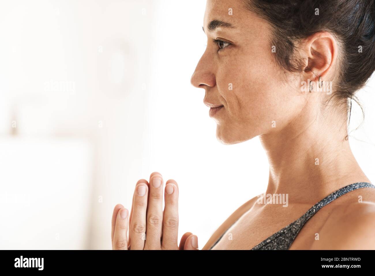 Image of a young relaxing beautiful amazing strong fitness woman ...