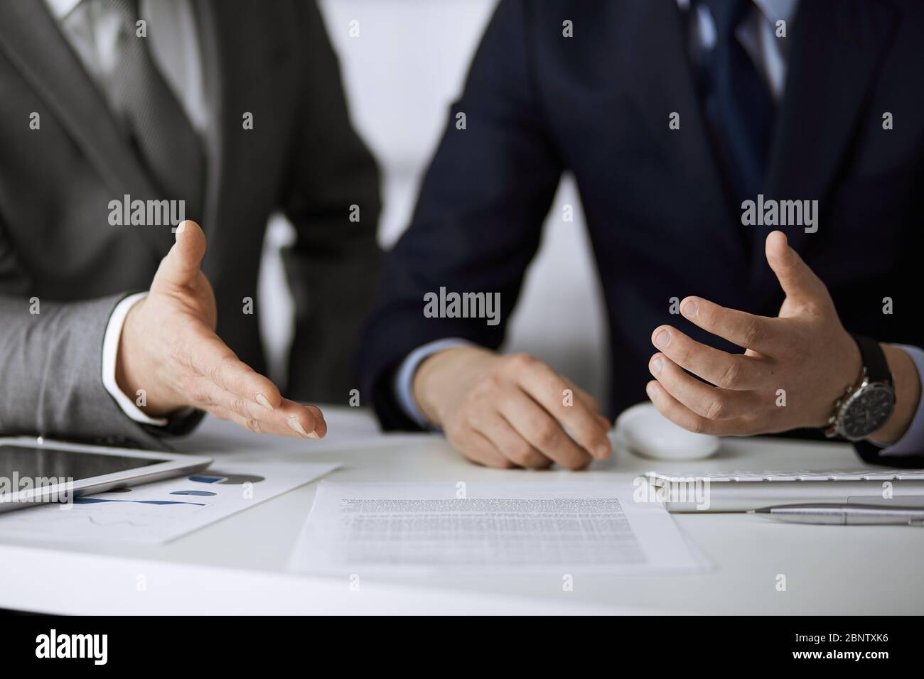 Business people using computer while working together in modern office ...