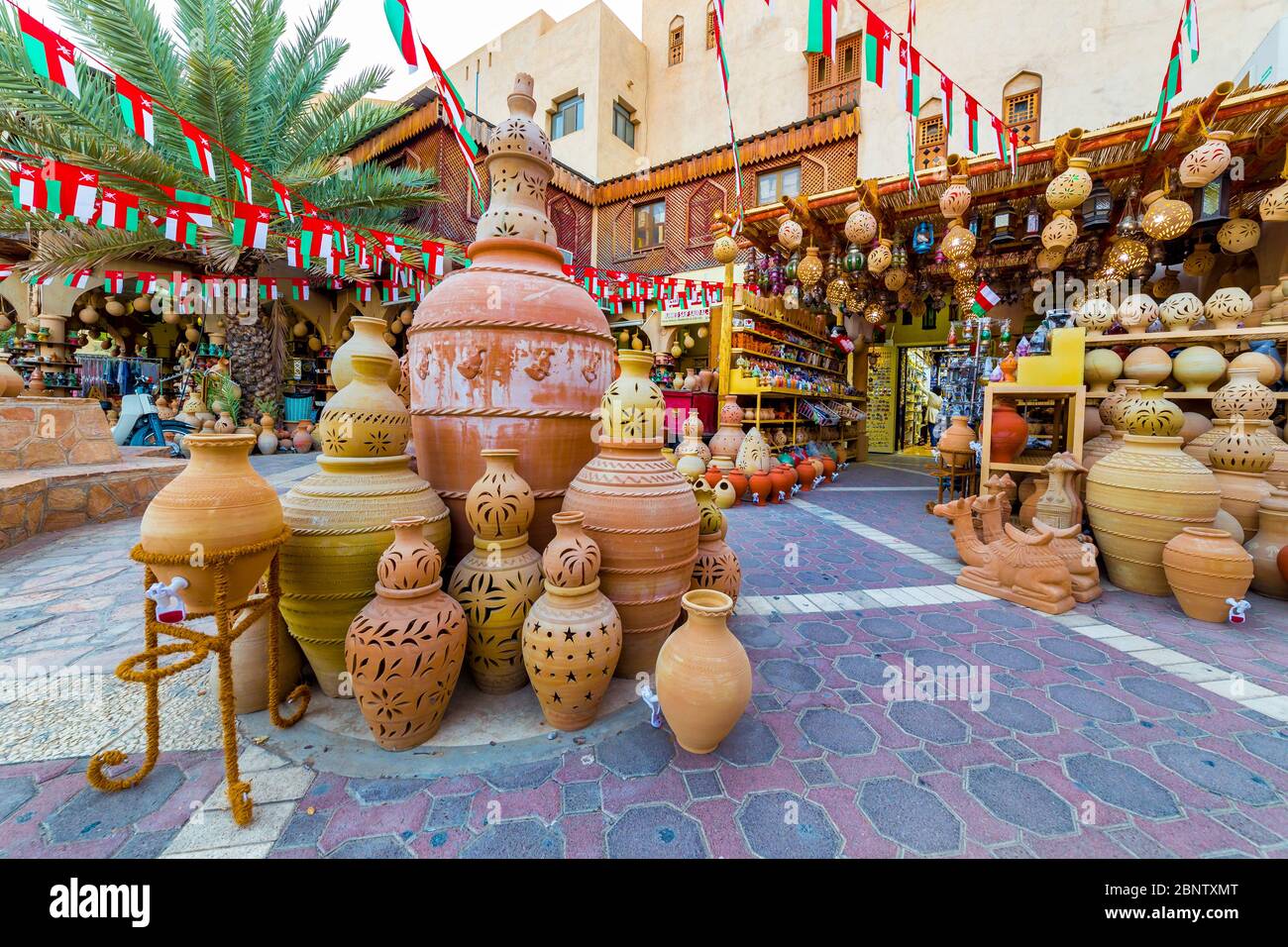 Handicraft products in the ancient Souq of Nizwa, in Oman Stock Photo ...