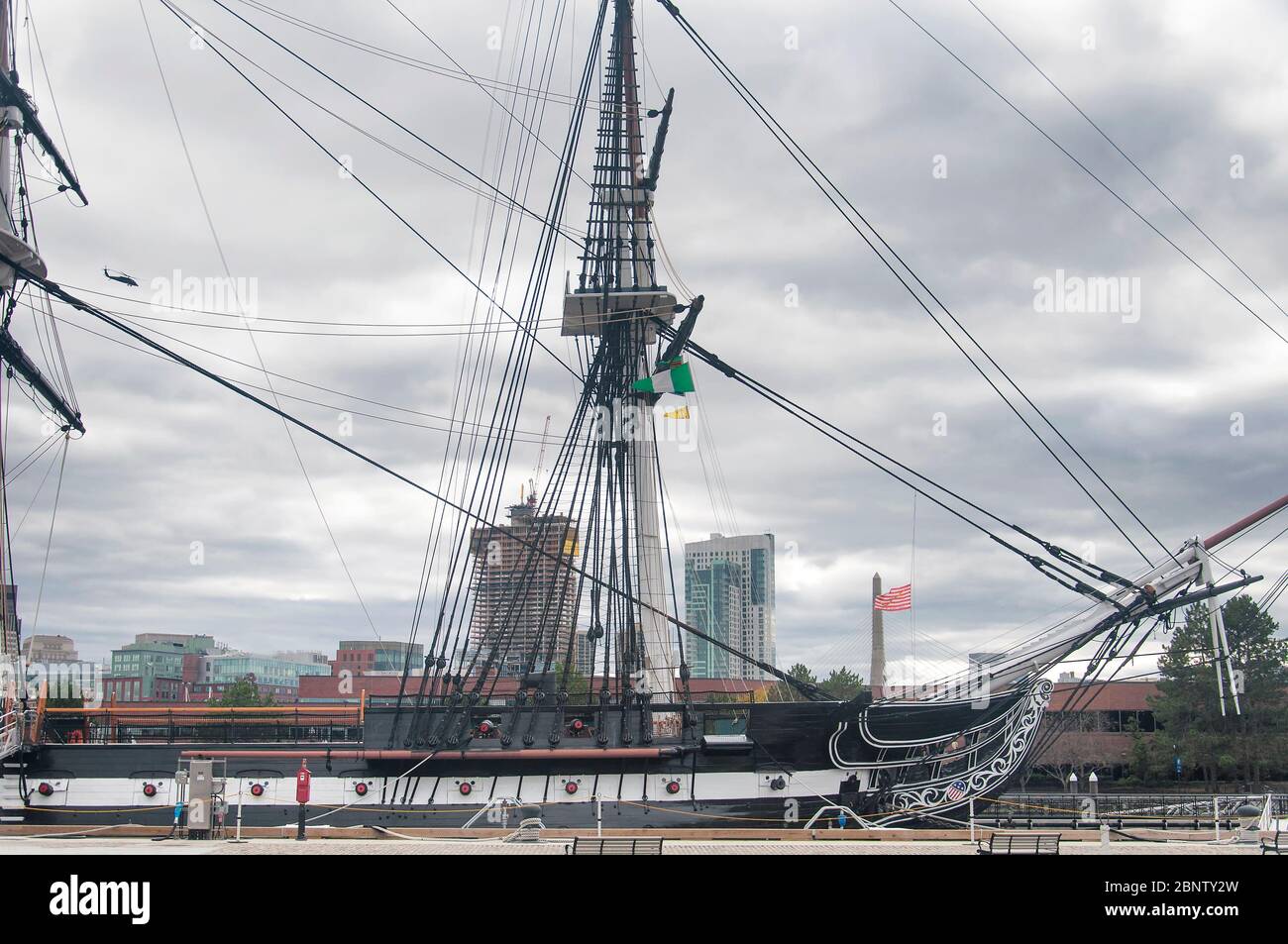 The USS Constitution at the Charlestown Navy Shipyard with the Boston ...