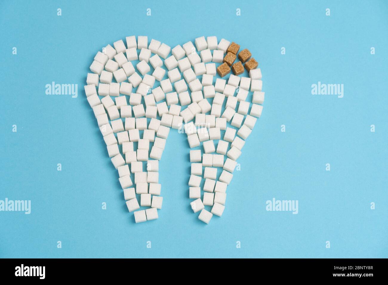 Sugar destroy tooth enamel leads tooth decay White Sugar cubes shape ...