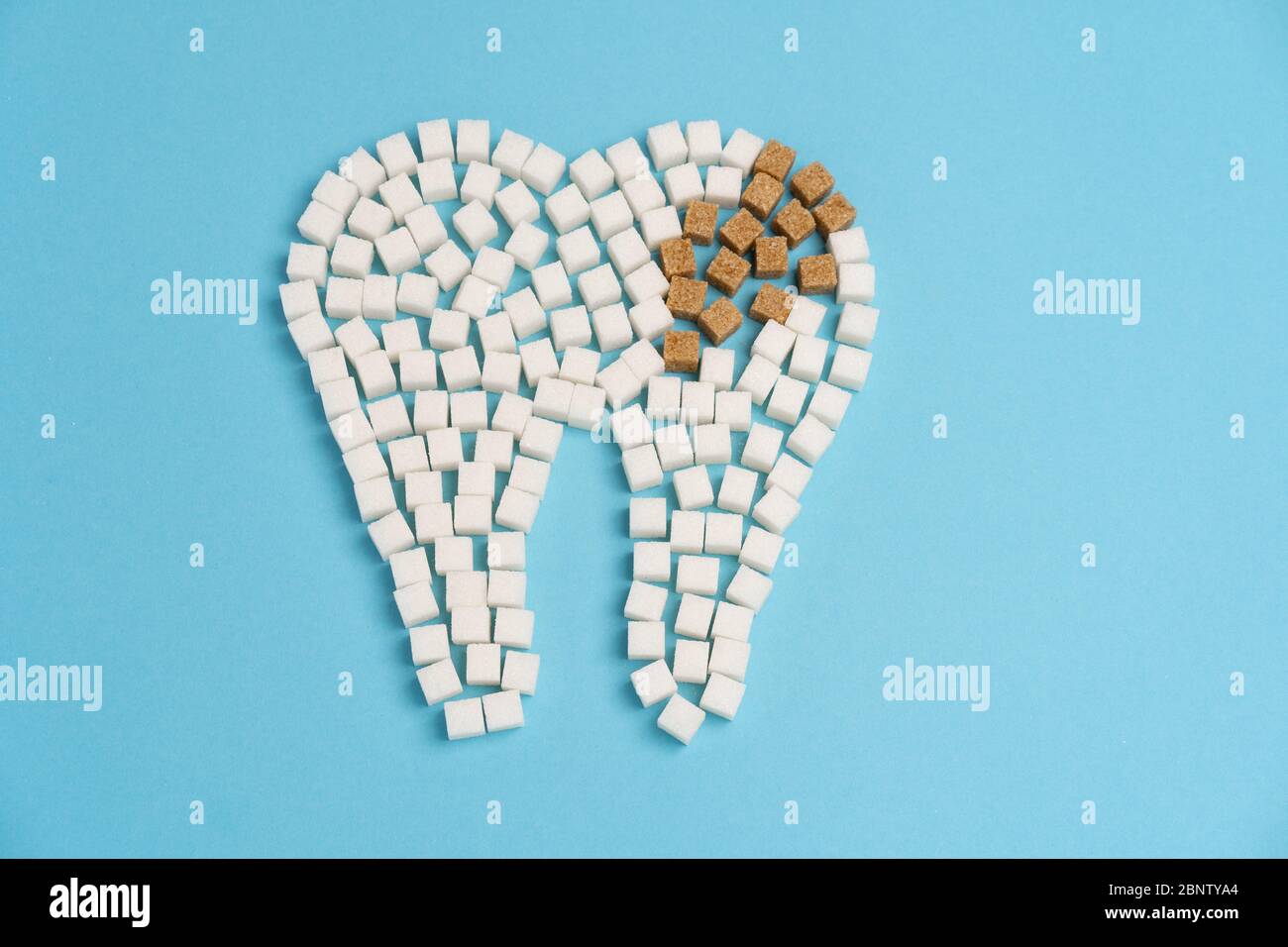 Sugar destroy tooth enamel leads tooth decay White Sugar cubes shape ...