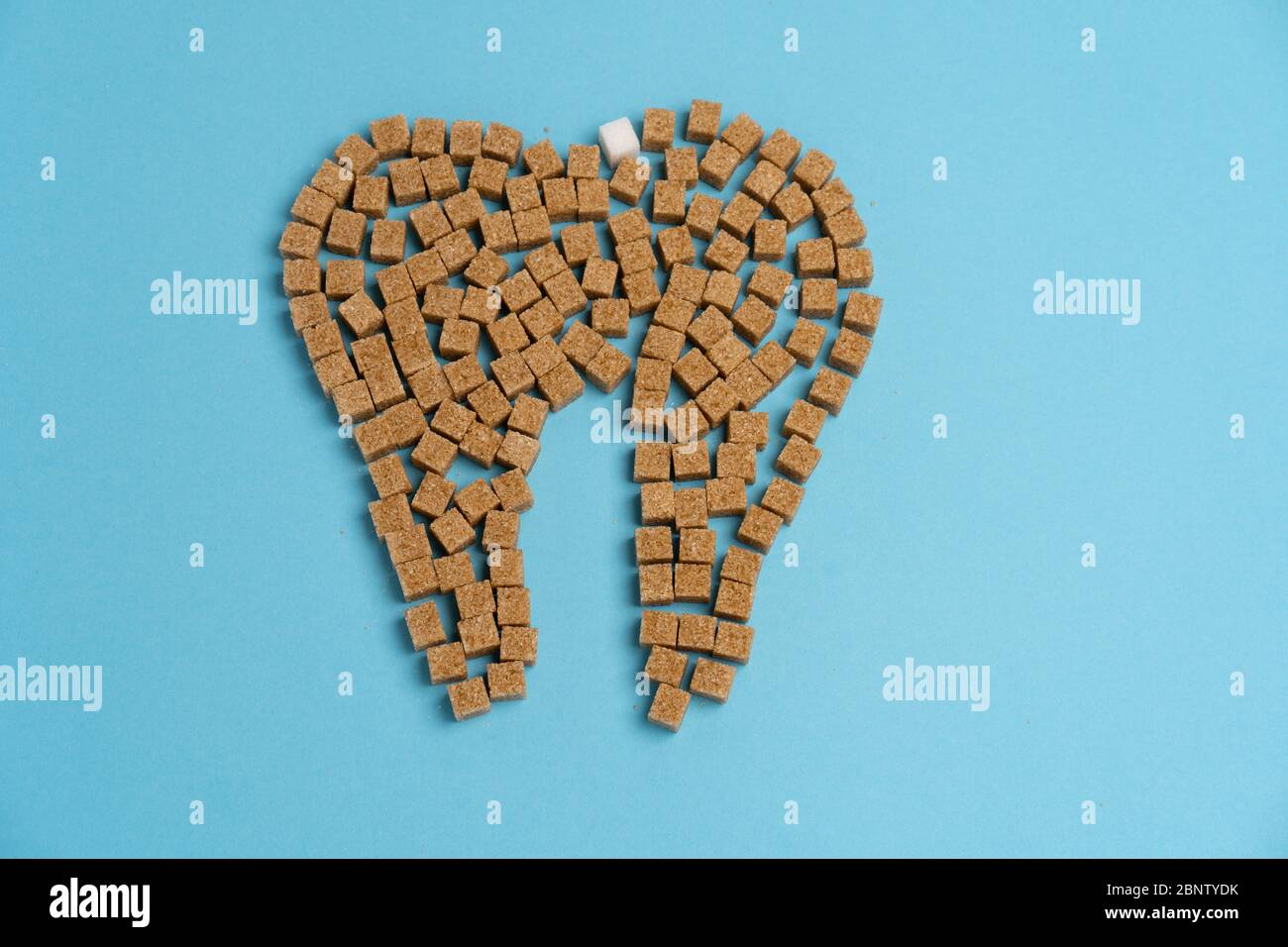 Sugar destroy tooth enamel leads tooth decay White Sugar cubes shape ...