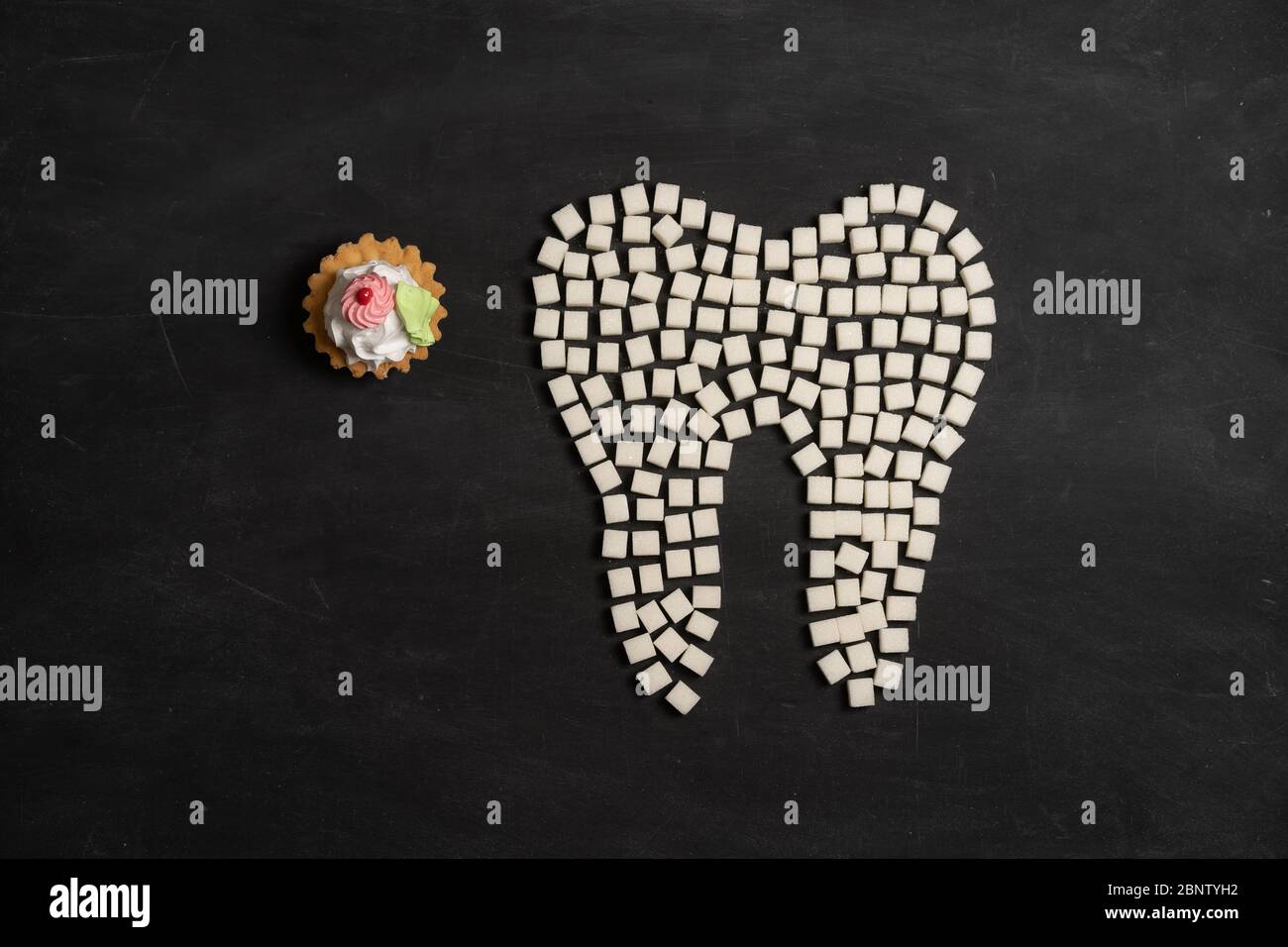 Sugar destroy tooth enamel leads tooth decay White Sugar cubes shape ...